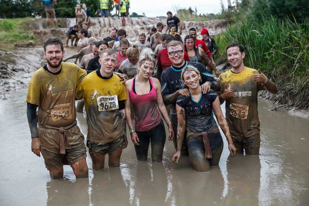 Rugby bankers go through muddy hell to fund flying doctors - The Rugby ...